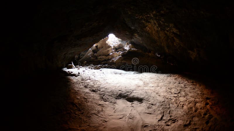 Light Rays Shine Inside of Lava Tube Cave - 4K Stock Footage - Video of ...