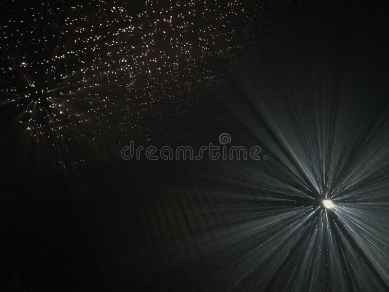 Light Rays through Small Holes in a Dark Space Stock Photo - Image of ...