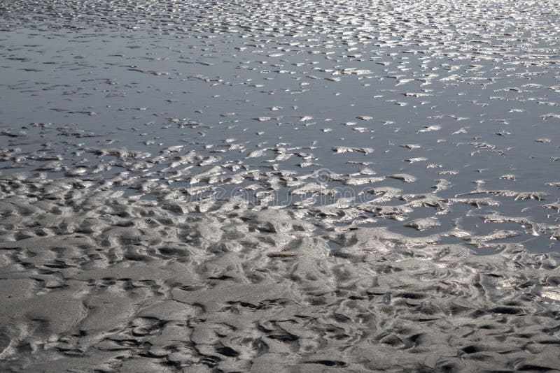 Light Reflecting Off Of Water And Rocky Shoreline Stock Photo - Image ...