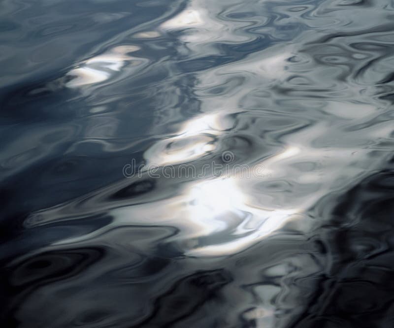 Light reflecting on water stock photo. Image of water - 30844818
