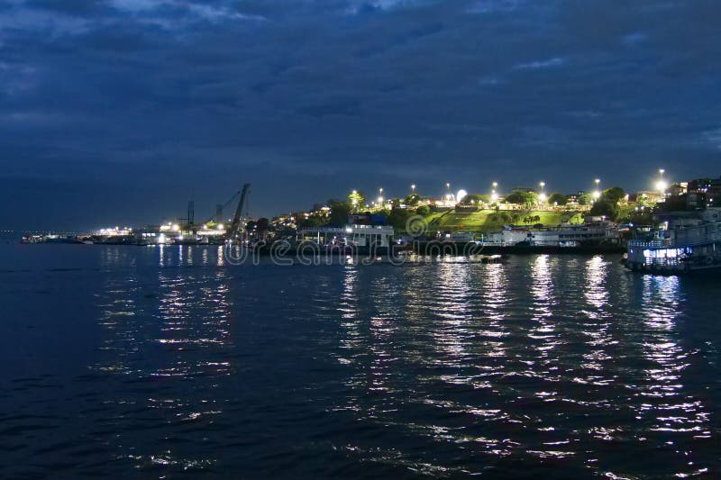 The Light Reflection of Several Goods Ferries on the Amazon River ...