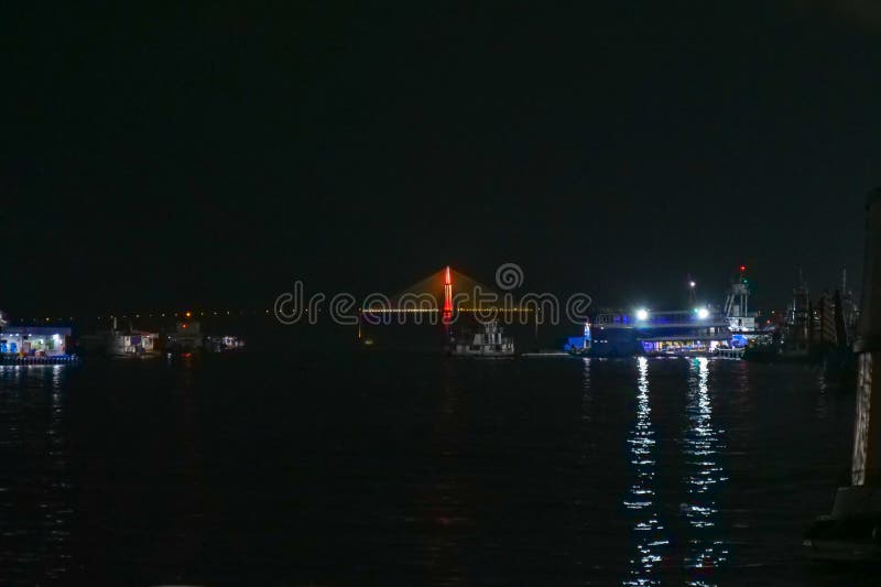 The Light Reflection of Several Goods Ferries on the Amazon River, with ...