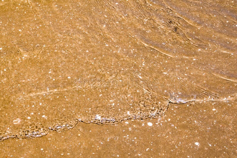 Light Reflection on Surface of Movement Sea on Sand Beach Stock Photo ...