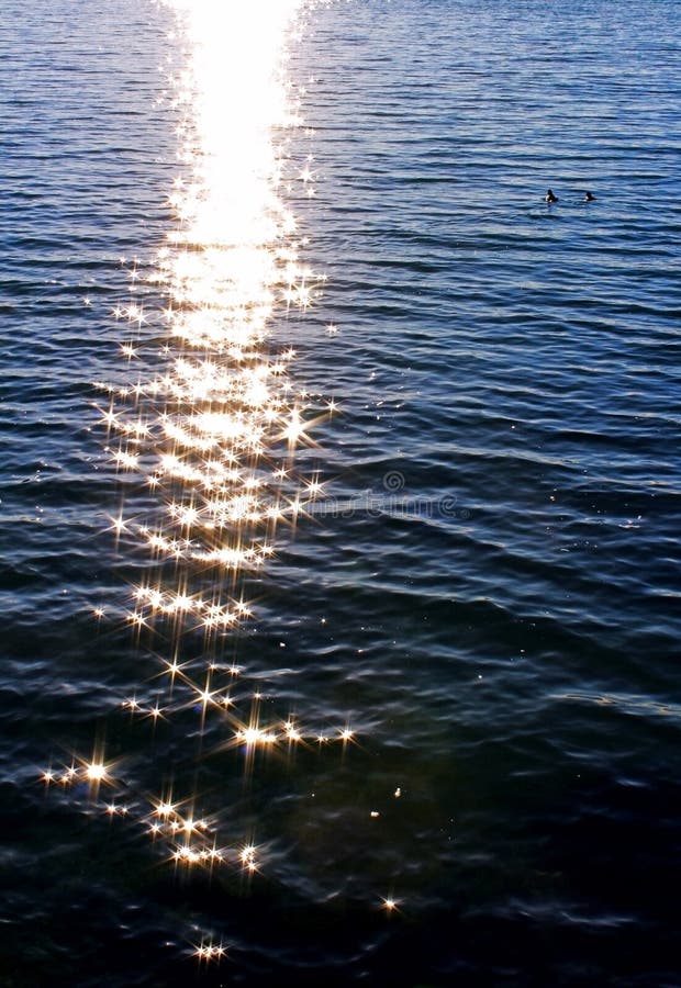 Light Reflection on the Surface of Ocean Stock Image - Image of golden ...