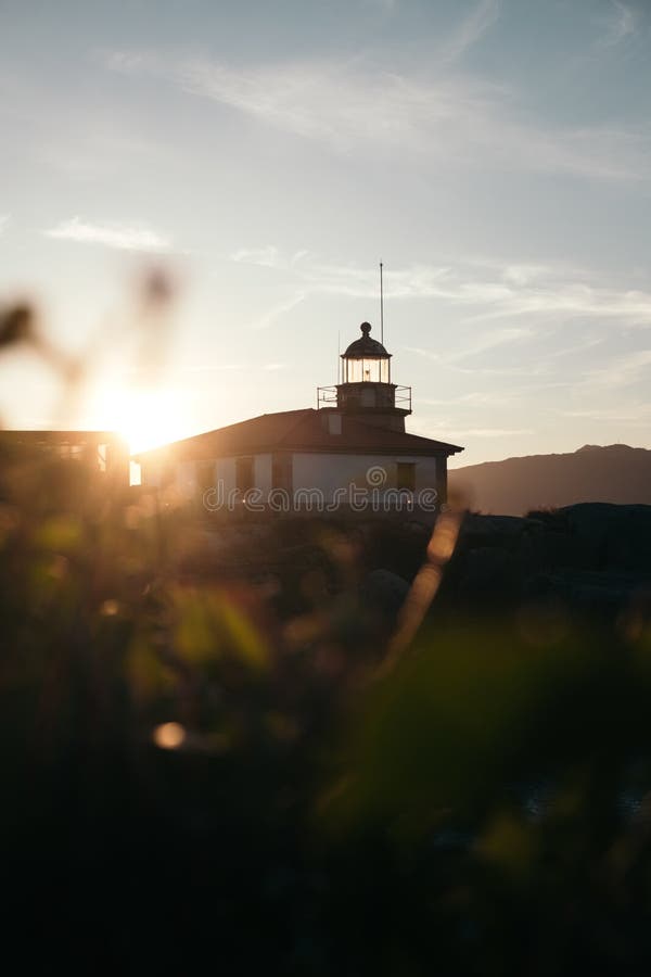 Light of the Rising Sun Covering a Building in Arousa, Galicia, Spain ...