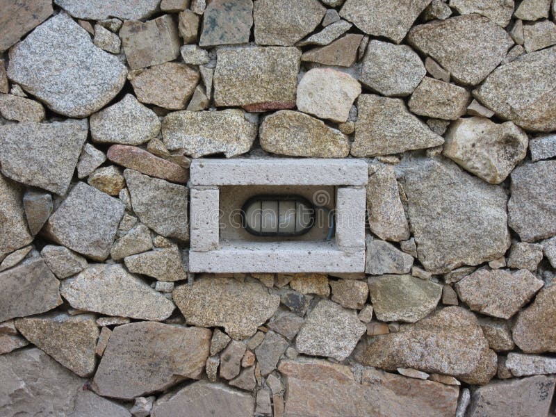 Light in rock wall stock image. Image of fixture, granite - 75670039