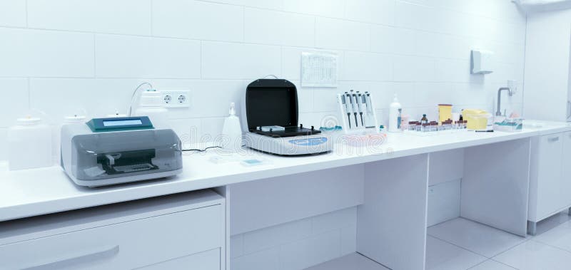 Light Room with Modern Laboratory Equipment on Table Stock Image ...