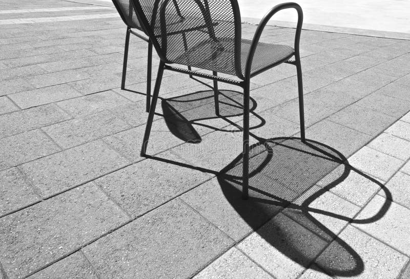 Light and Shadow of the Chairs in the Outdoor Cafe Stock Image - Image ...
