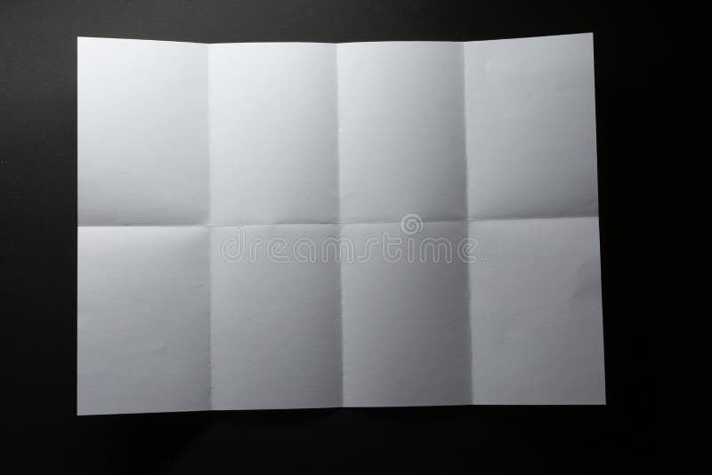 Light and Shadow on Creases in Sheet of White Paper Folded into Eight ...