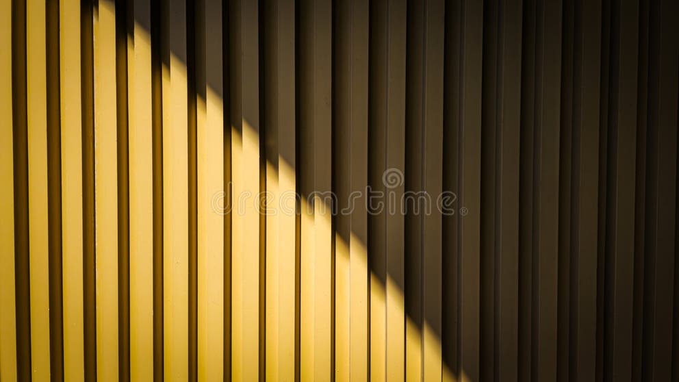 Light and Shadow Create Geometric Shapes and Divide the Wall into Two ...