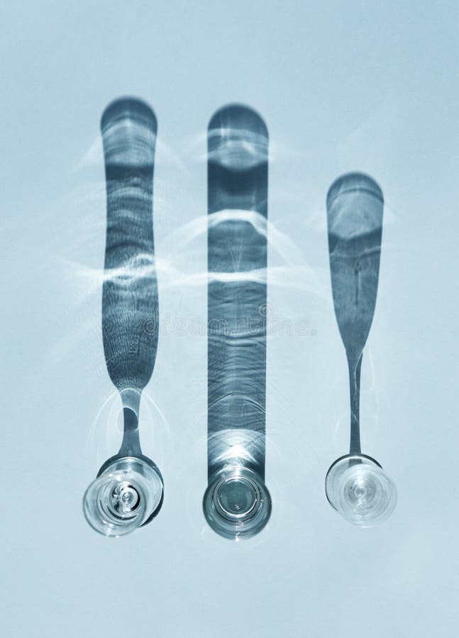 Light and Shadow from Glass Transparent Objects. Stock Photo - Image of ...