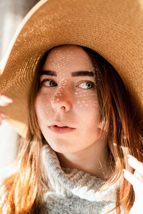 Portrait of a Beautiful Young Woman in a Straw Hat with a Shadow ...