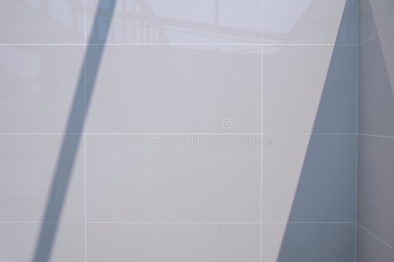 Light and Shadow on Surface of Interior Gray Tile Bathroom Wall ...