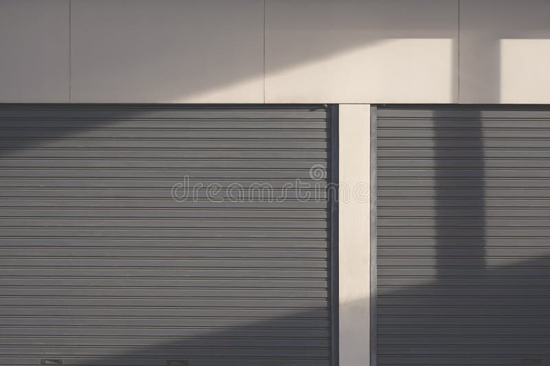 Light and Shadow on Surface of the Old 2 Steel Roller Shutter Doors ...