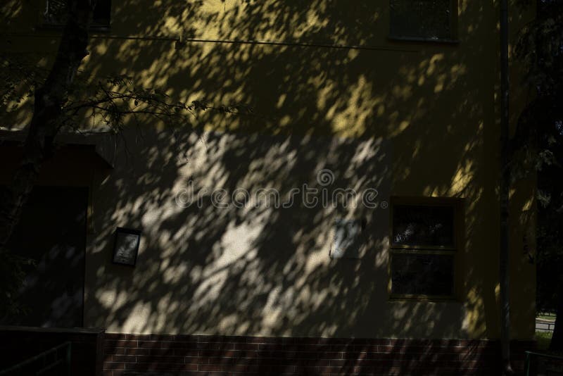 Light and Shadow on Wall. Shadow Drawing on Building Stock Photo ...