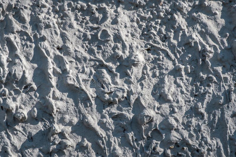 The Light and the Shadow of the Wall Made of Stones Plastered, Rough ...