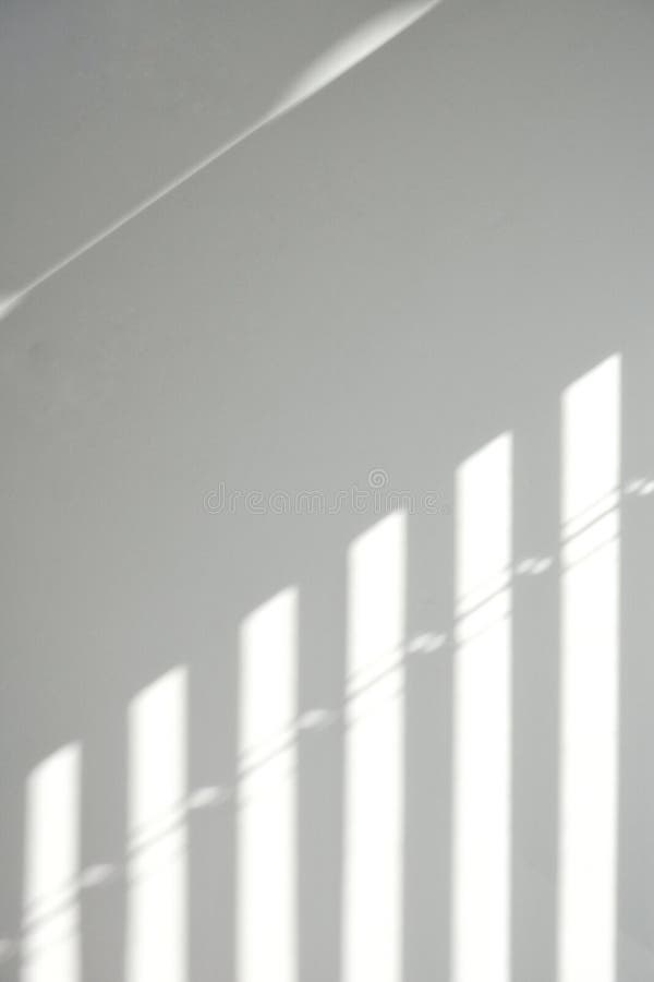 Light and Shadows on a Light Wall through the Window Blinds. Stock ...