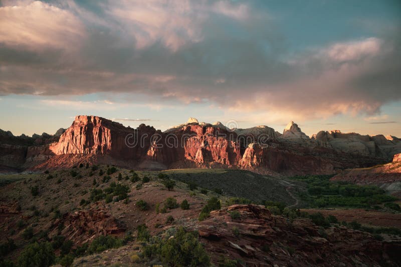 Light Shines on Red Cliffs from Scenic Drive Stock Photo - Image of ...