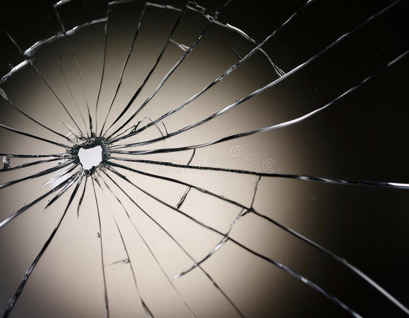 Light Shining through a Broken Glass Window Pane with a Bullet Hole ...