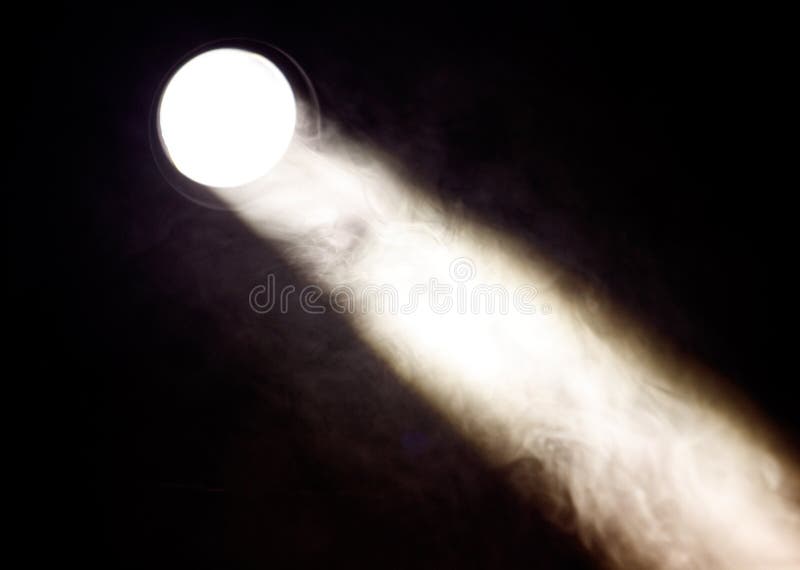 A Light is Shining on a Dark Background, Creating a Contrast between ...