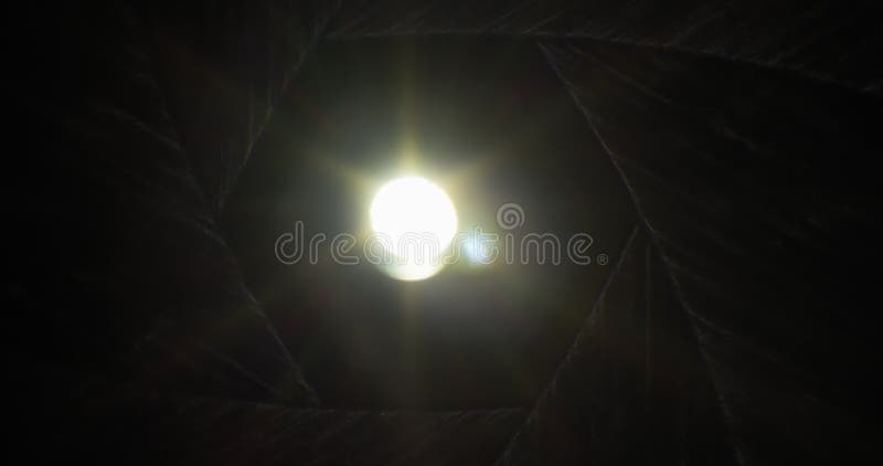 Light Shining through Old Camera Lens, while Diaphragm Blades are ...