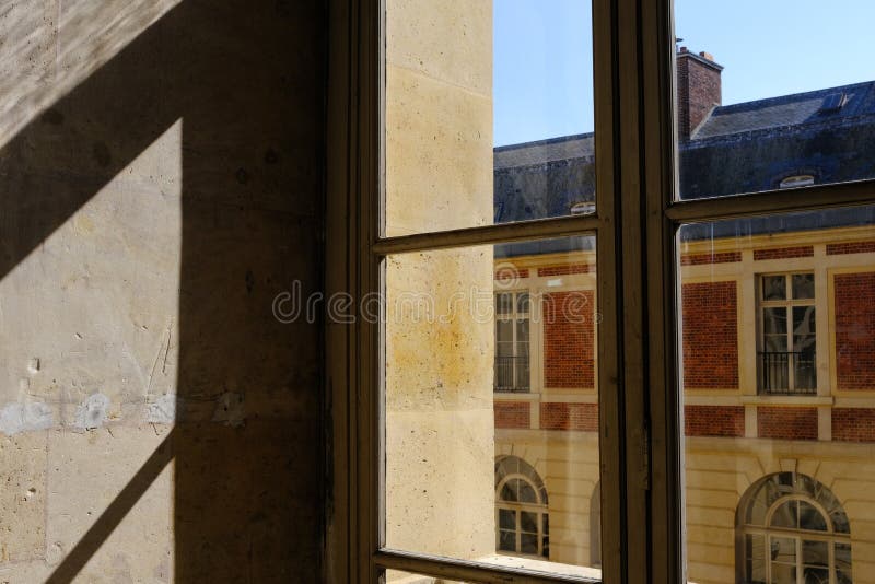 Light Shining through the Window Down on the Concrete Wall. Stock Photo ...