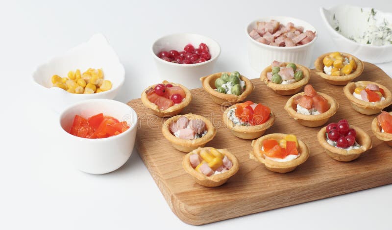 Light Snacks in a Plate on a Buffet Table. Assorted Mini Canapes ...