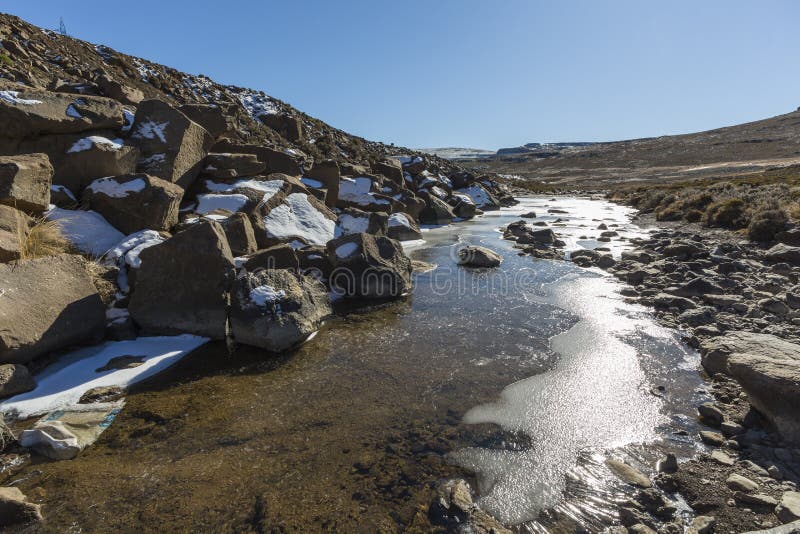 Light Snow on rocks stock image. Image of beauty, season - 79923701