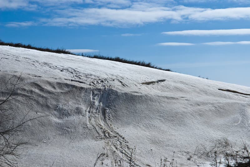 Light Snow Slope on a Background of Blue Sky Stock Photo - Image of ...