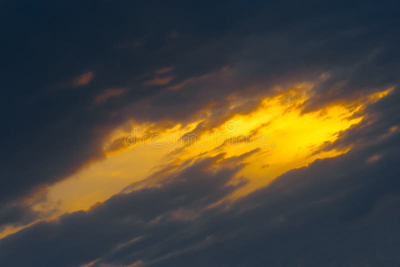 Light Spot Orange Sunset through Dark Rain Clouds Storm Beam Light Sky ...