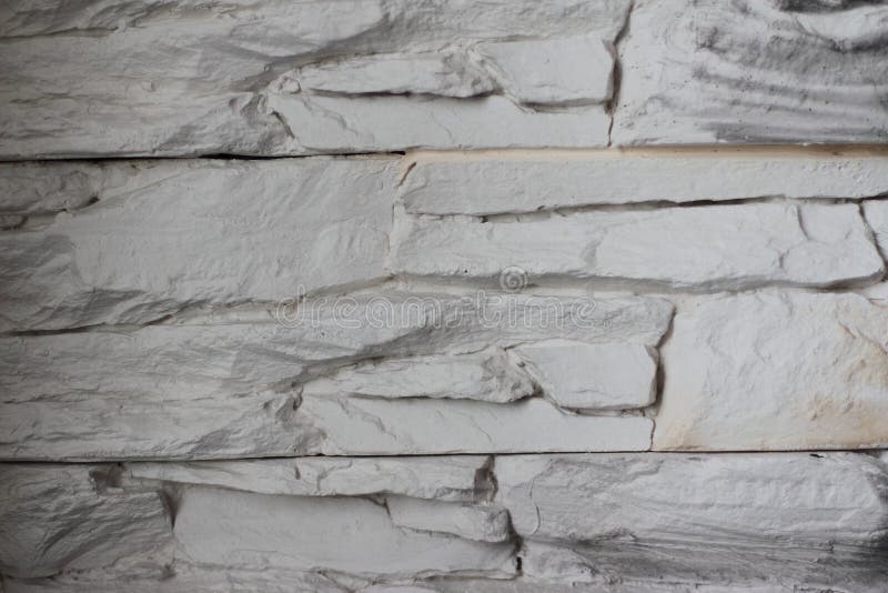 Light stone wall stock photo. Image of uneven, facade - 127298620