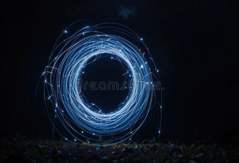 Light Swirls Create a Captivating Circular Pattern in the Dark Night ...