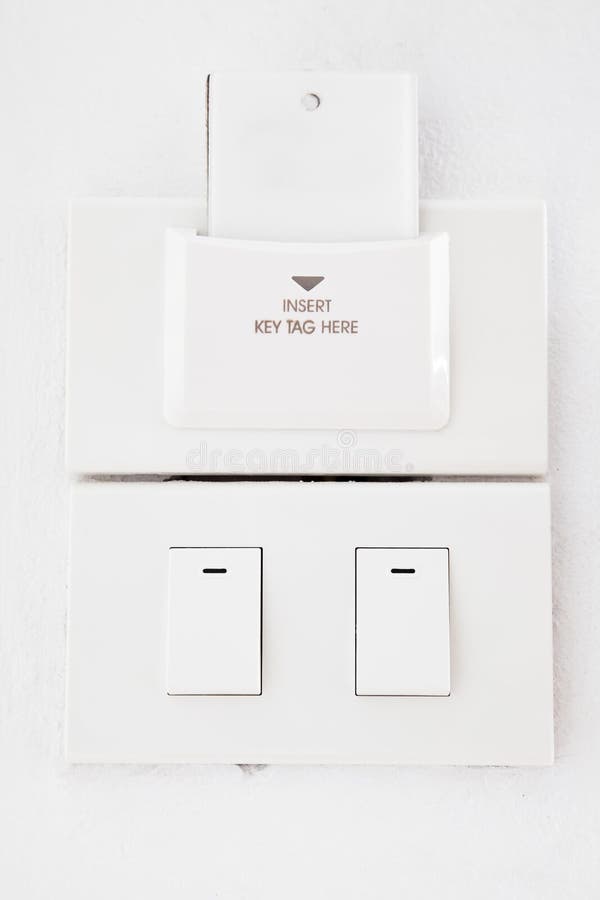 Light Switch and Blank Key Tag on Wall Stock Image - Image of saving ...