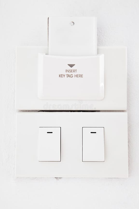 Light Switch and Blank Key Tag on Wall Stock Image - Image of saving ...