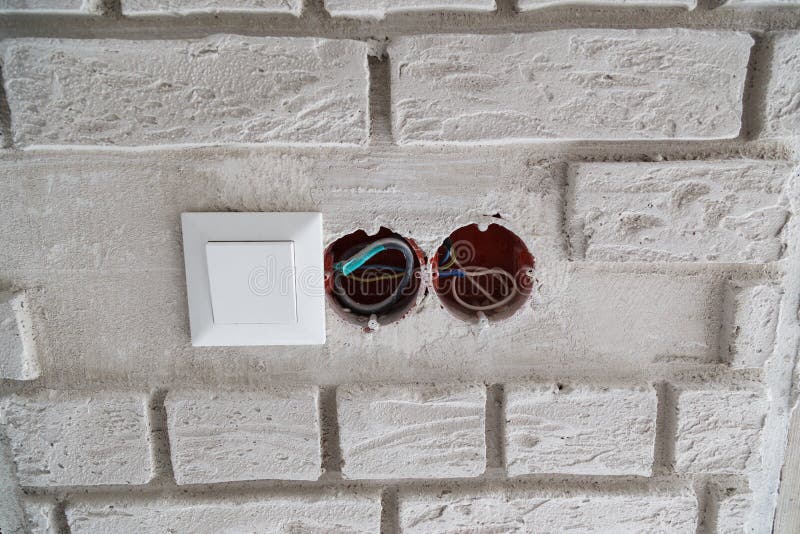 Light Switch and Electrical Socket Hole on Concrete Wall. Stock Photo ...
