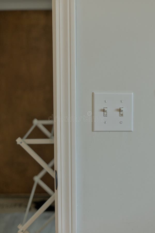 Light Switch Next To Laundry Drying Rack in Utility Room Stock Image ...
