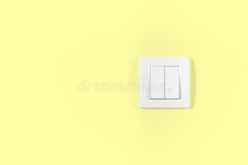 Light Switch on Pastel Yellow Wall. Electricity and Light Symbol Stock ...