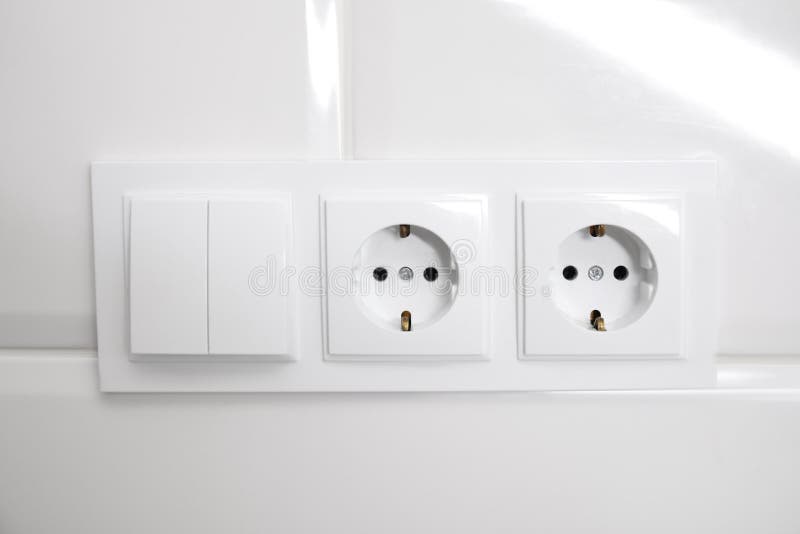 Light Switch and Power Sockets on White Wall Indoors Stock Image ...