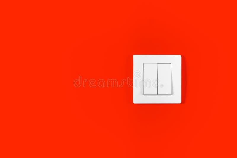 Light switch on red wall stock photo. Image of power - 306924232