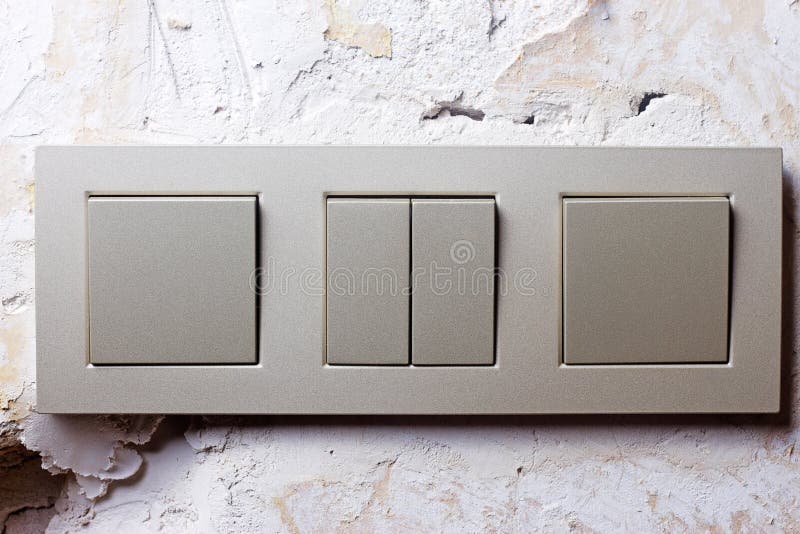 Light switch on the wall stock photo. Image of electronic - 47400034