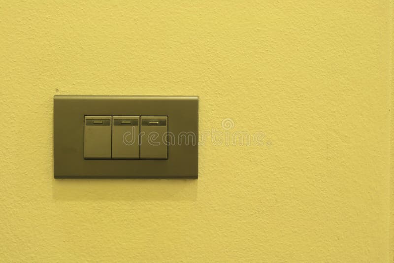 Light Switch on Yellow Walls Stock Photo - Image of power, electrical ...