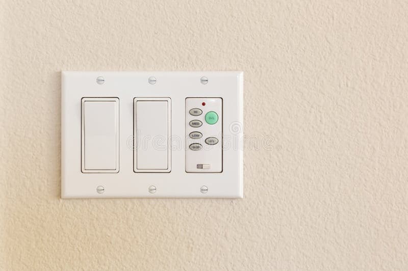 Light Switches and Fan Control on Wall Stock Photo - Image of home ...