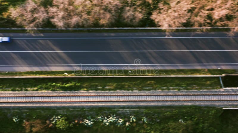 Light Traffic on a Road that Runs Parallel To a Train Railway Stock ...
