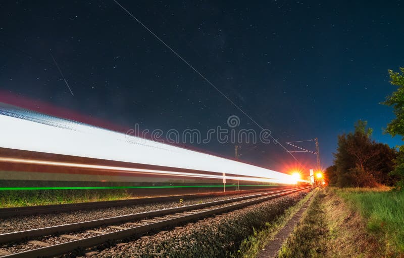 Light Trails of a Fast Driving Train at Night with the Stars of the ...