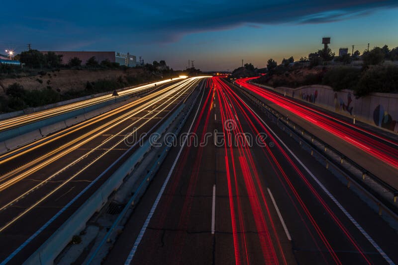 Light Trails on the Highway Stock Photo - Image of hour, bands: 144814148