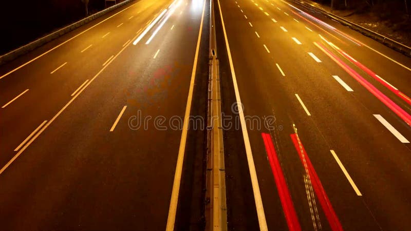 The Light Trails of Cars Merge Together Resembling a River Flowing ...