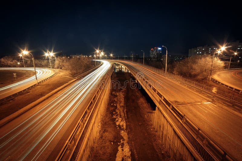 Light Trails at Night on the Road with Overpass Stock Photo - Image of ...