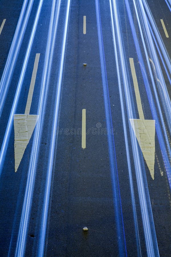 Light Trails Over Traffic Signs at Night Stock Photo - Image of signs ...