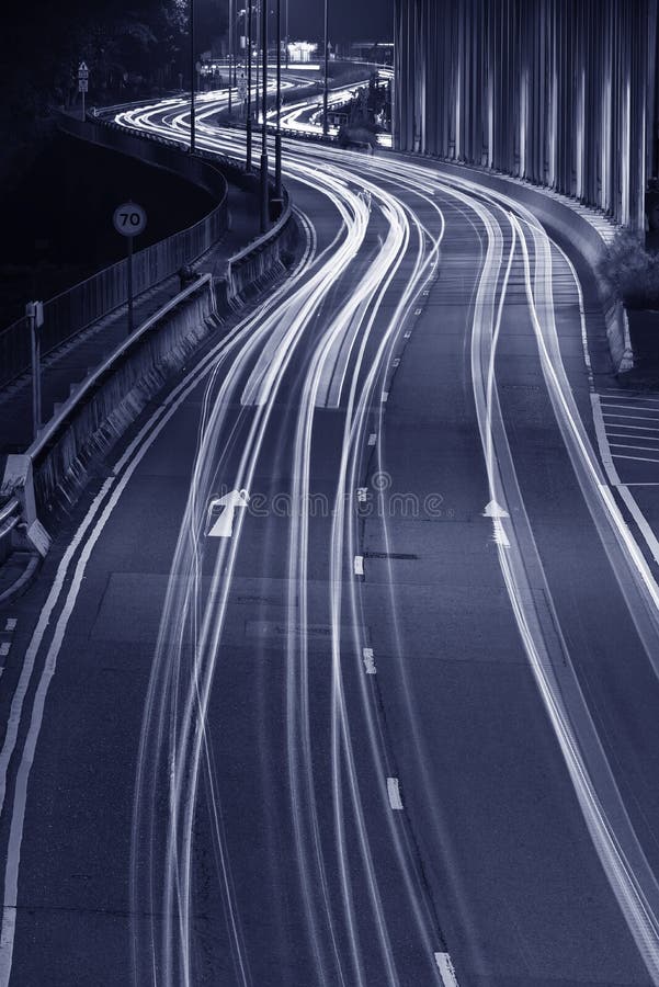 Light Trails of Traffic on Road at Night. Transportation Background ...