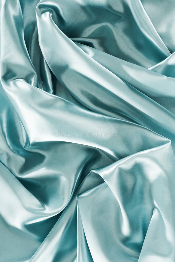 Turquoise shiny wavy satin stock photo. Image of soft - 129533538